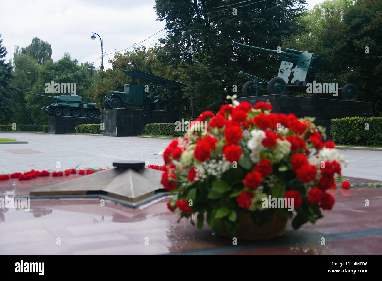 Moscow, Russia, July 28, 2013: Flowers on the background of Soviet ...