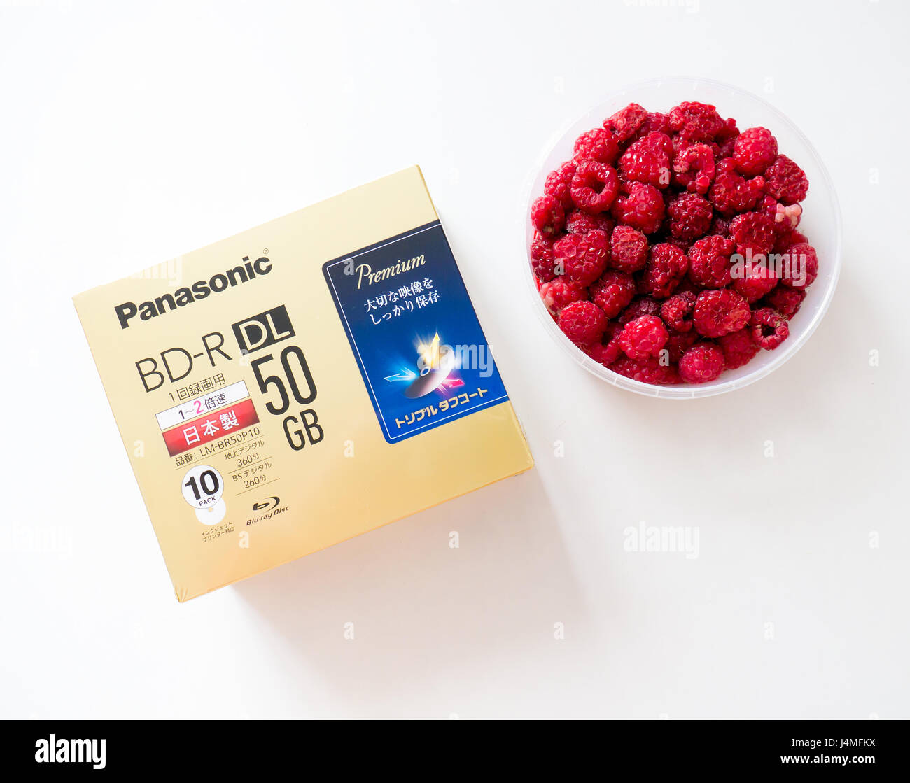 GOMEL, BELARUS - FEBRUARY 4, 2017: PANASONIC BD- RE DL 50GB, LM-BR50P10 and raspberries ...