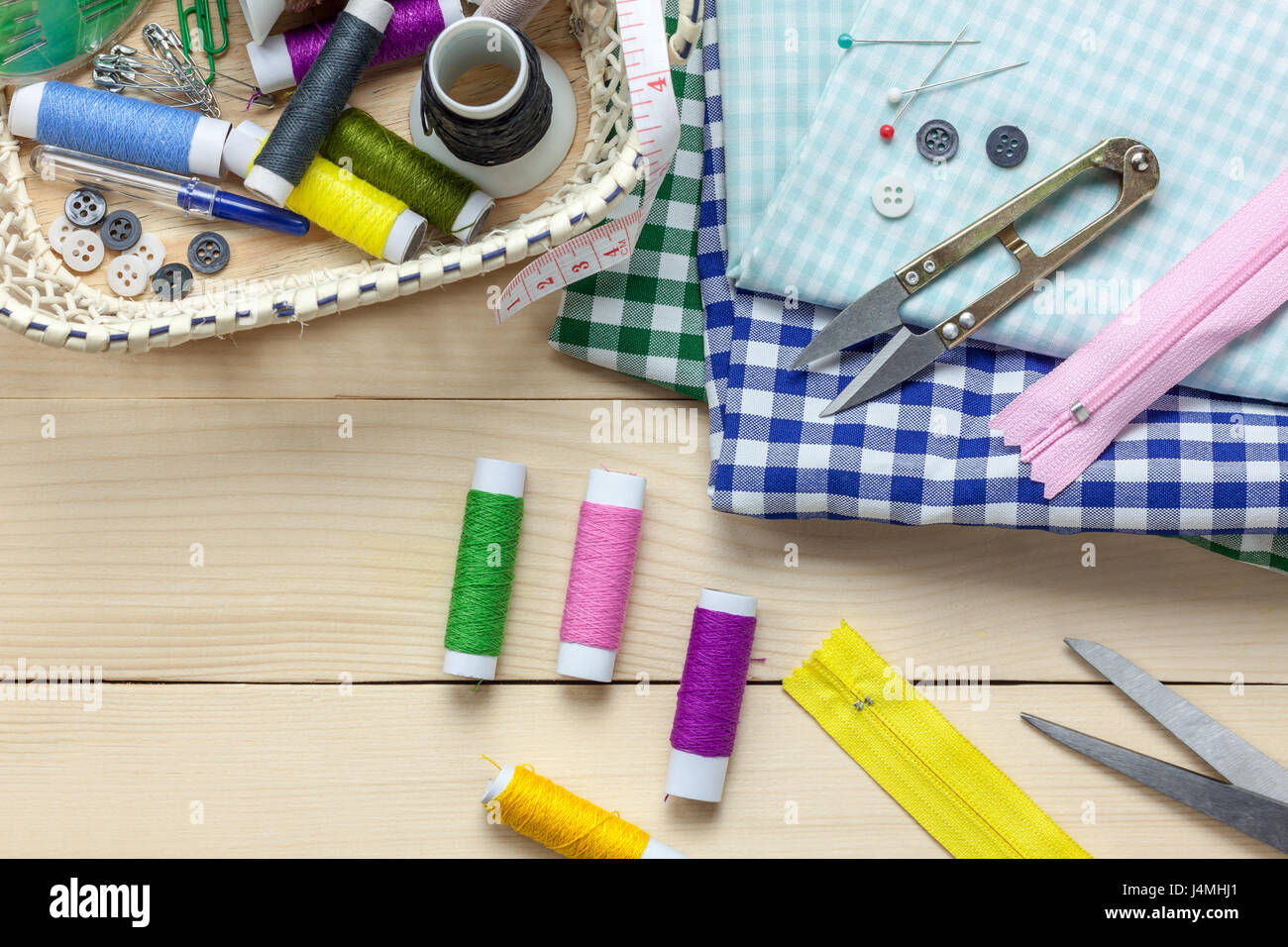 Top view tailor items on wooden background with copy space Stock Photo ...