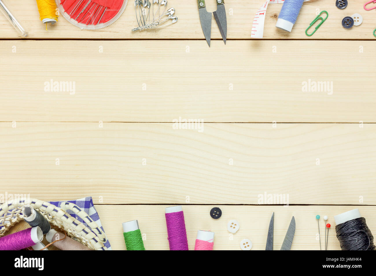 Top view tailor items on wooden background with copy space Stock Photo ...