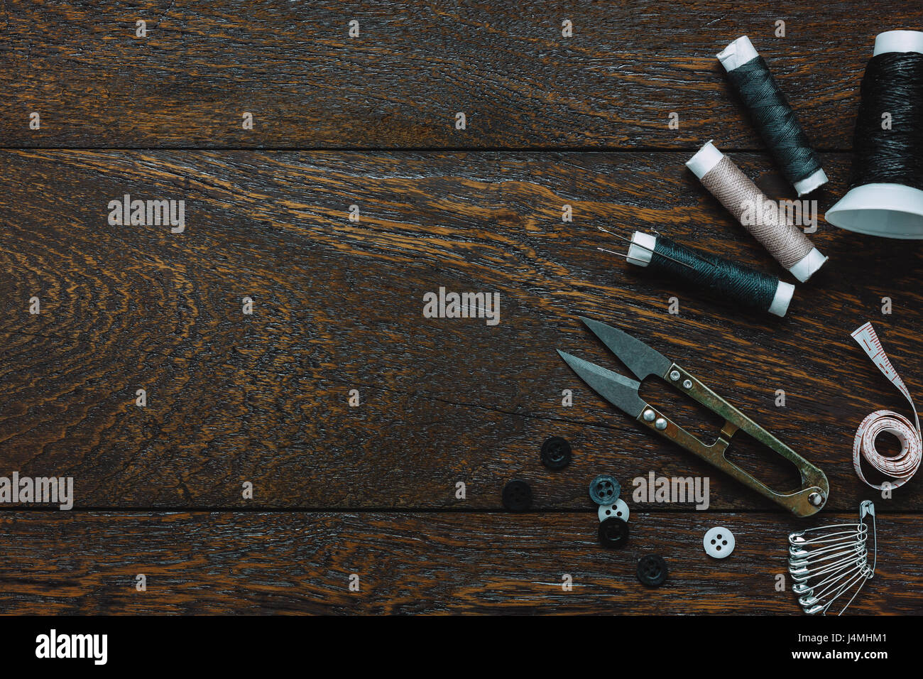 Top view tailor items on wooden background with copy space Stock Photo ...