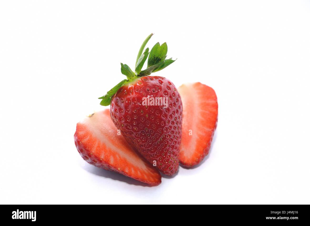 Strawberries half cut fruits hi-res stock photography and images - Alamy