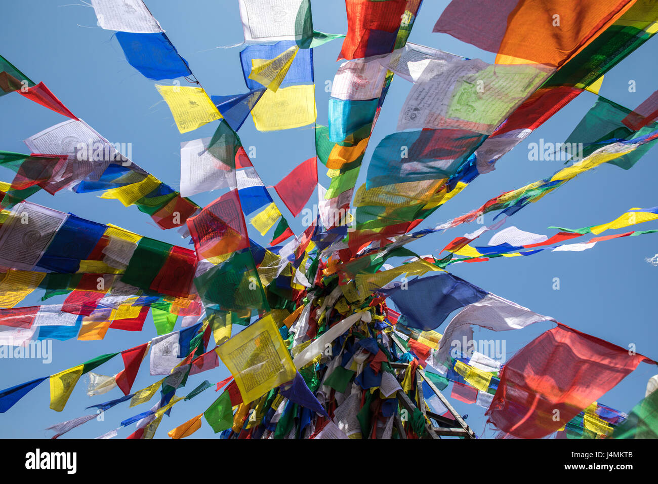 Colorful prayer flag mountain near ancient and holy Namobuddha ...