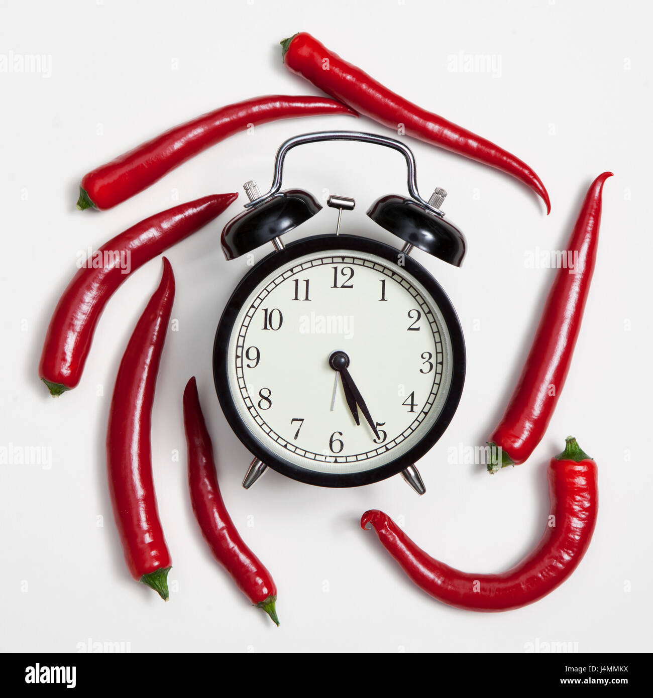 Clock in a frame of red chili pepper - card for recipes. On white ...