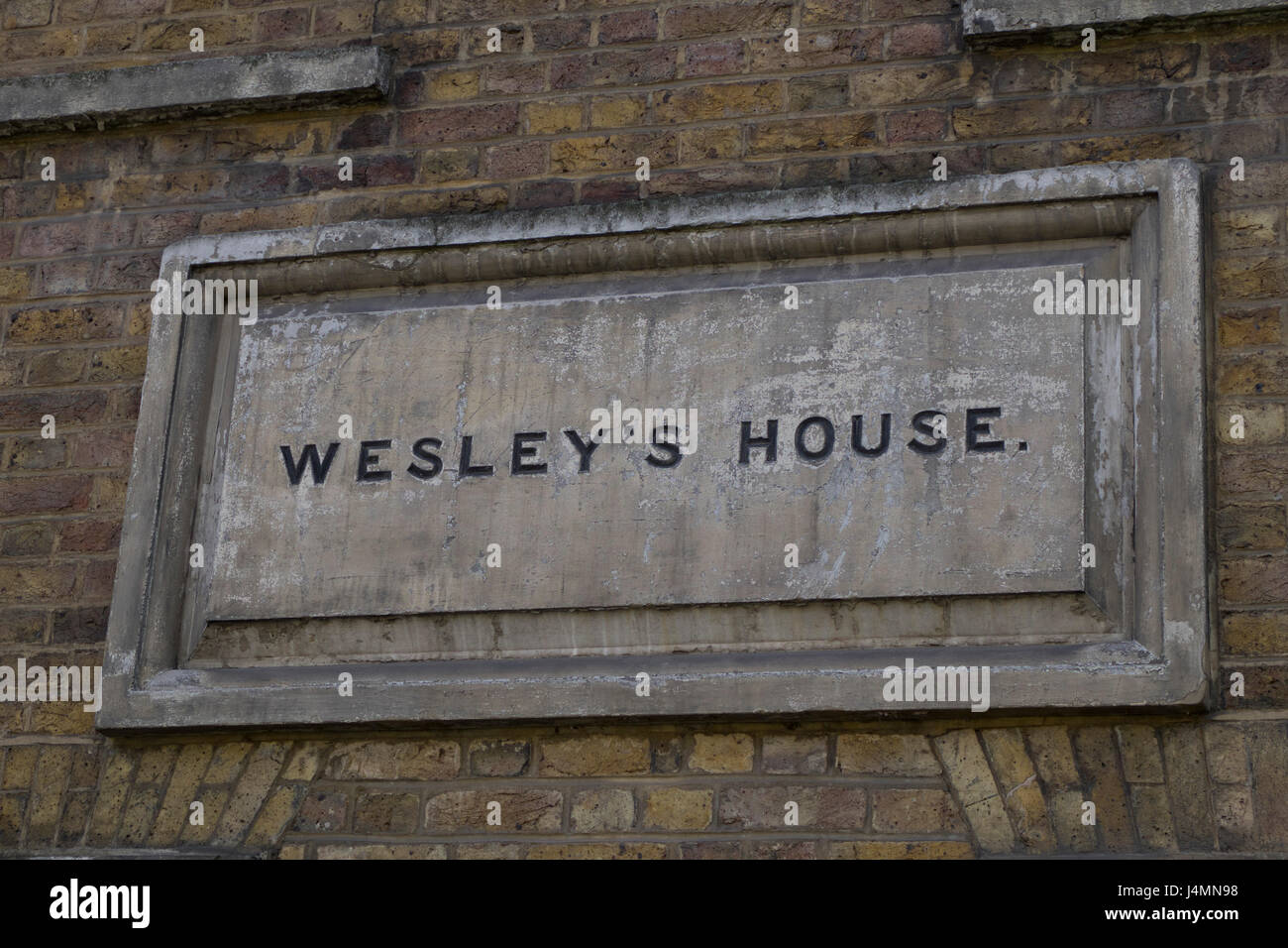 Garden at Wesley House by the tatue of John Wesley, founder of the ...