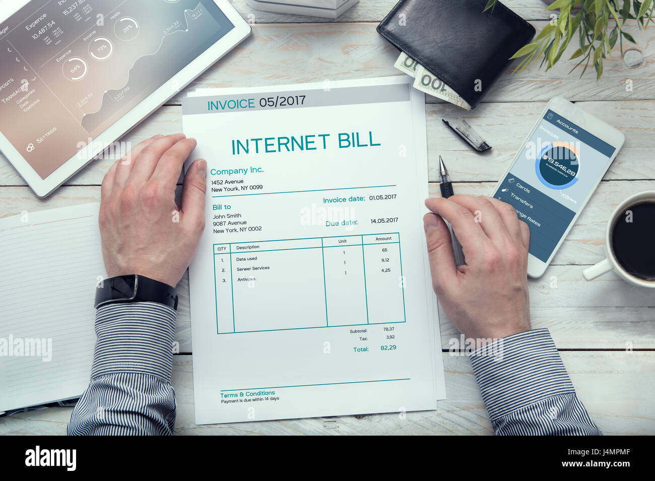 Internet bill invoice on the white table Stock Photo - Alamy