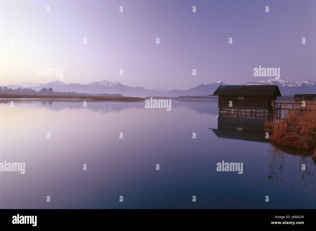 Germany, Upper Bavaria, Lake Chiem, boathouse, dusk Europe, South ...