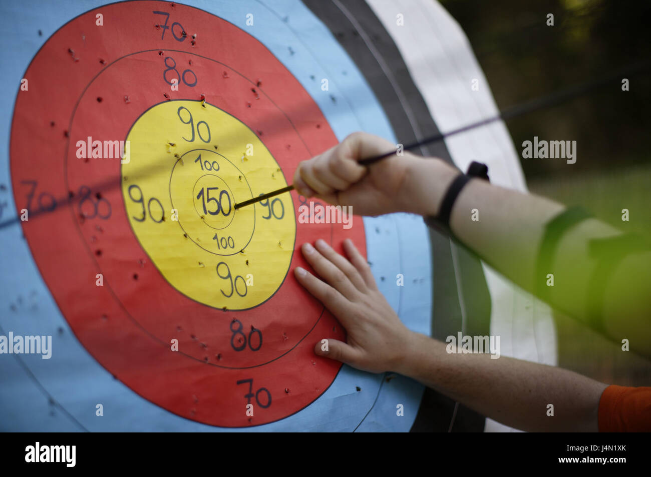 Archery, target, detail, hands, arrow, pull out, sport, leisure time ...