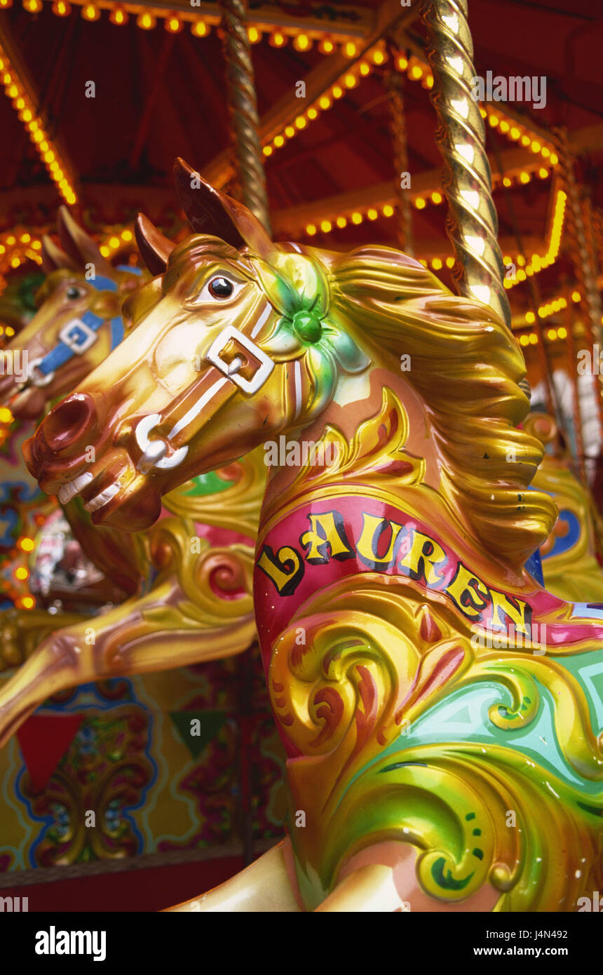 Roundabout, horses, detail Stock Photo - Alamy