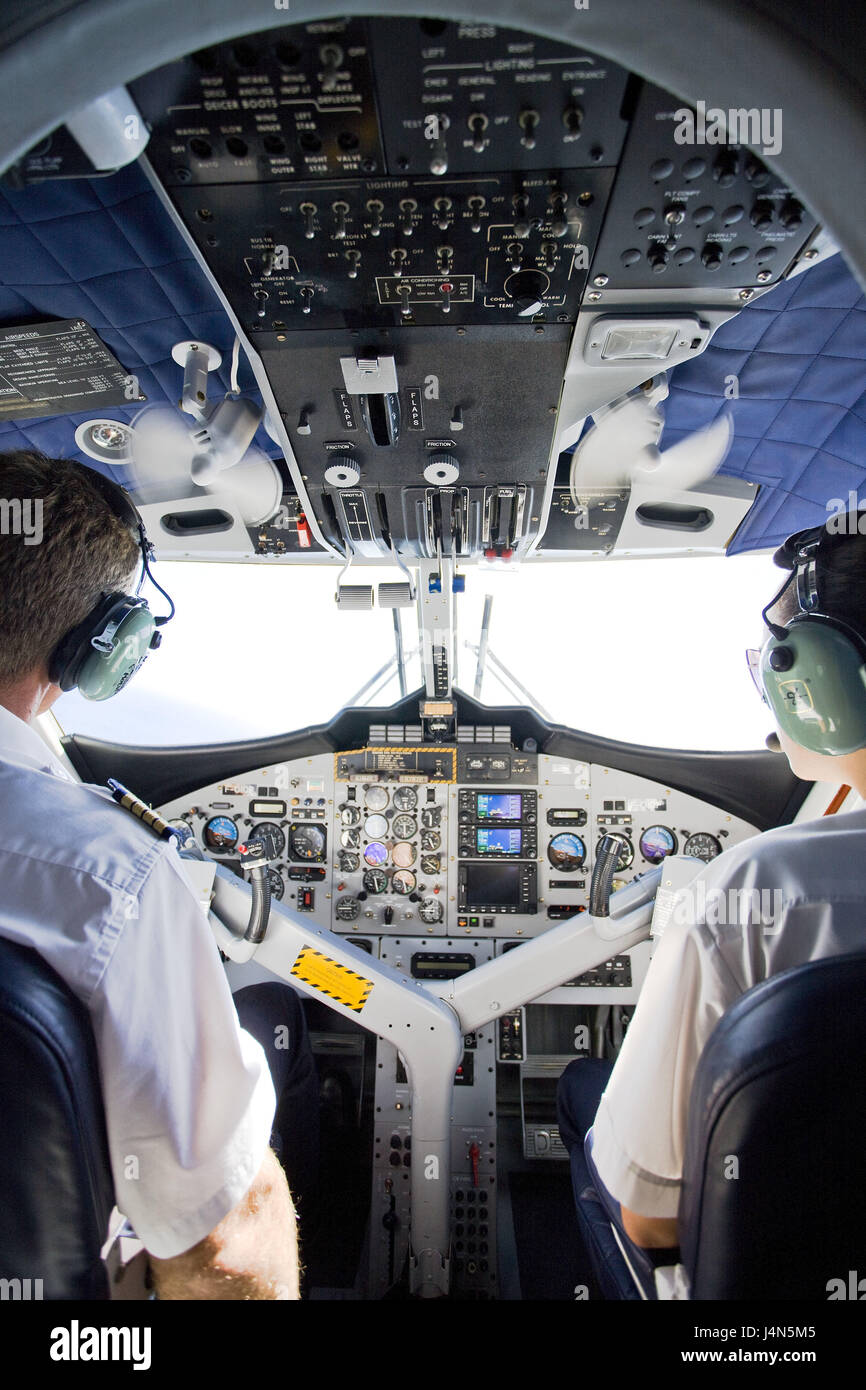Airplane, pilot, back view, curled Stock Photo - Alamy