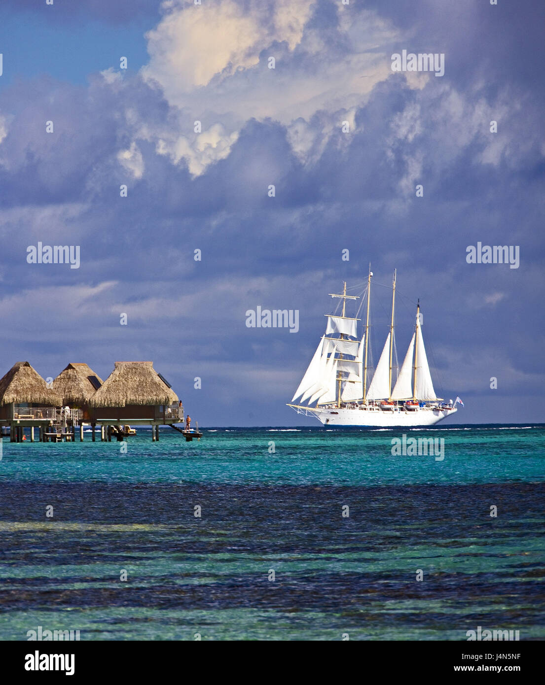 French Polynesia, Moorea, beach, building on stilts, sailing ship Stock ...