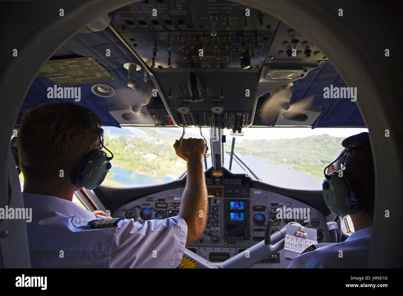 Airplane, pilot, back view, curled Stock Photo - Alamy