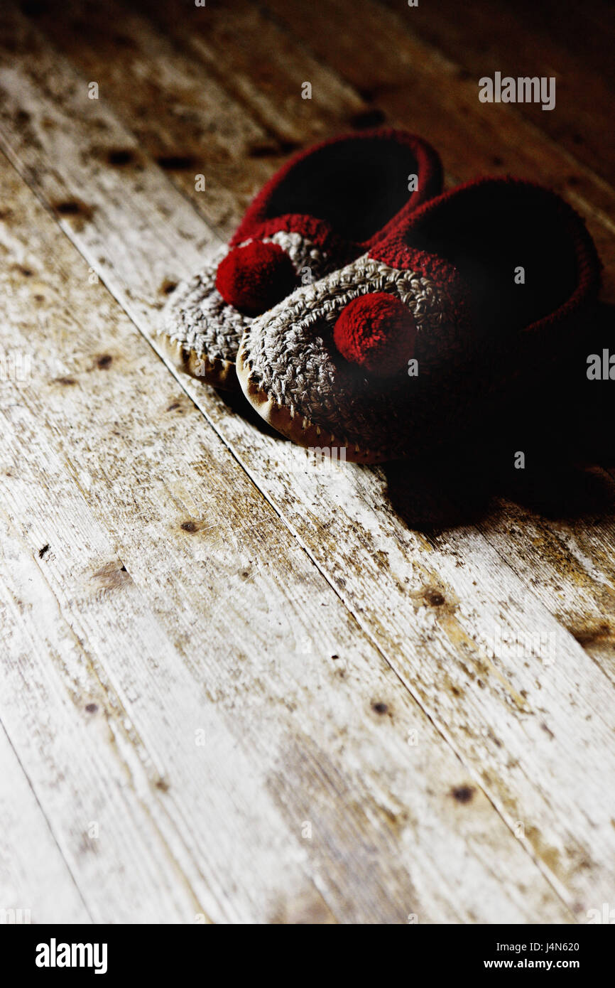 Slippers, straw finches, wooden floor red Stock Photo - Alamy