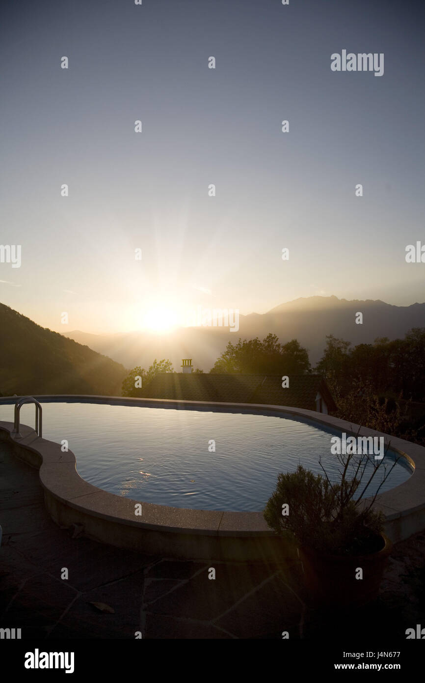 Mountain landscape, swimming pool, sundown Stock Photo - Alamy