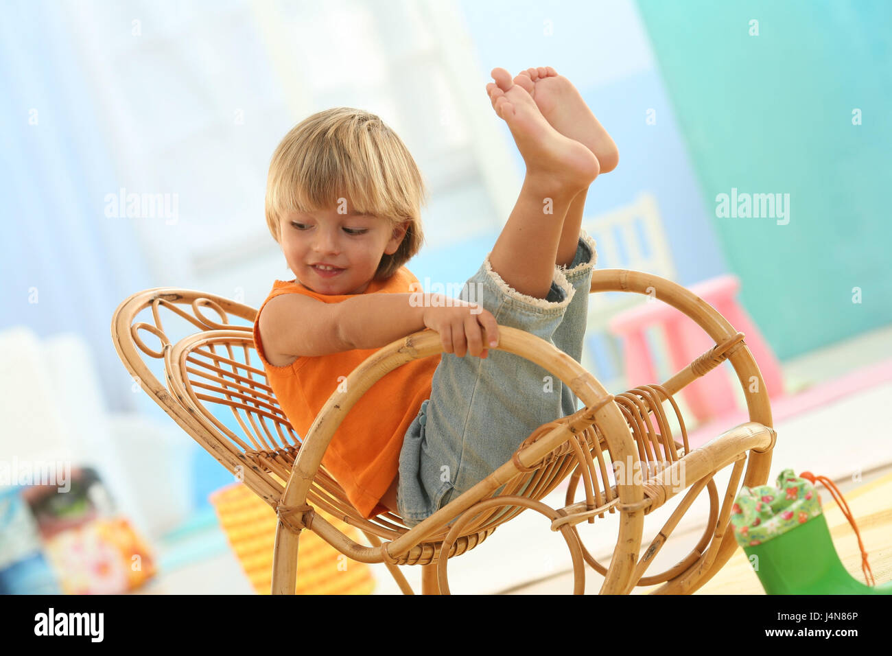 Boy, 3 years, rocking chair, seesaw, whole body Stock Photo - Alamy