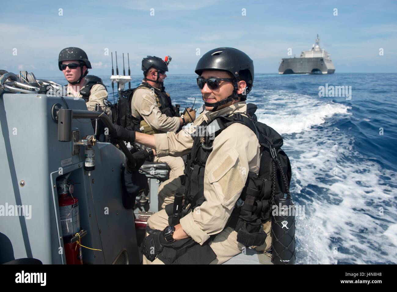 A U.S. Navy sailor from the littoral combat ship USS Coronado prepares ...