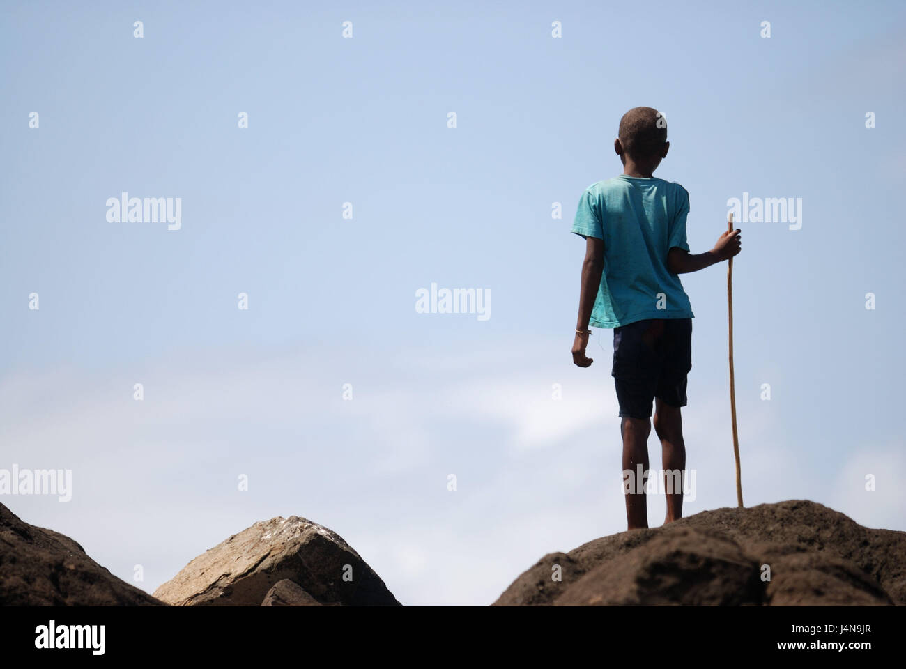 Child, boy, back view, view sea, island Santa Maria, Madagascar Stock ...