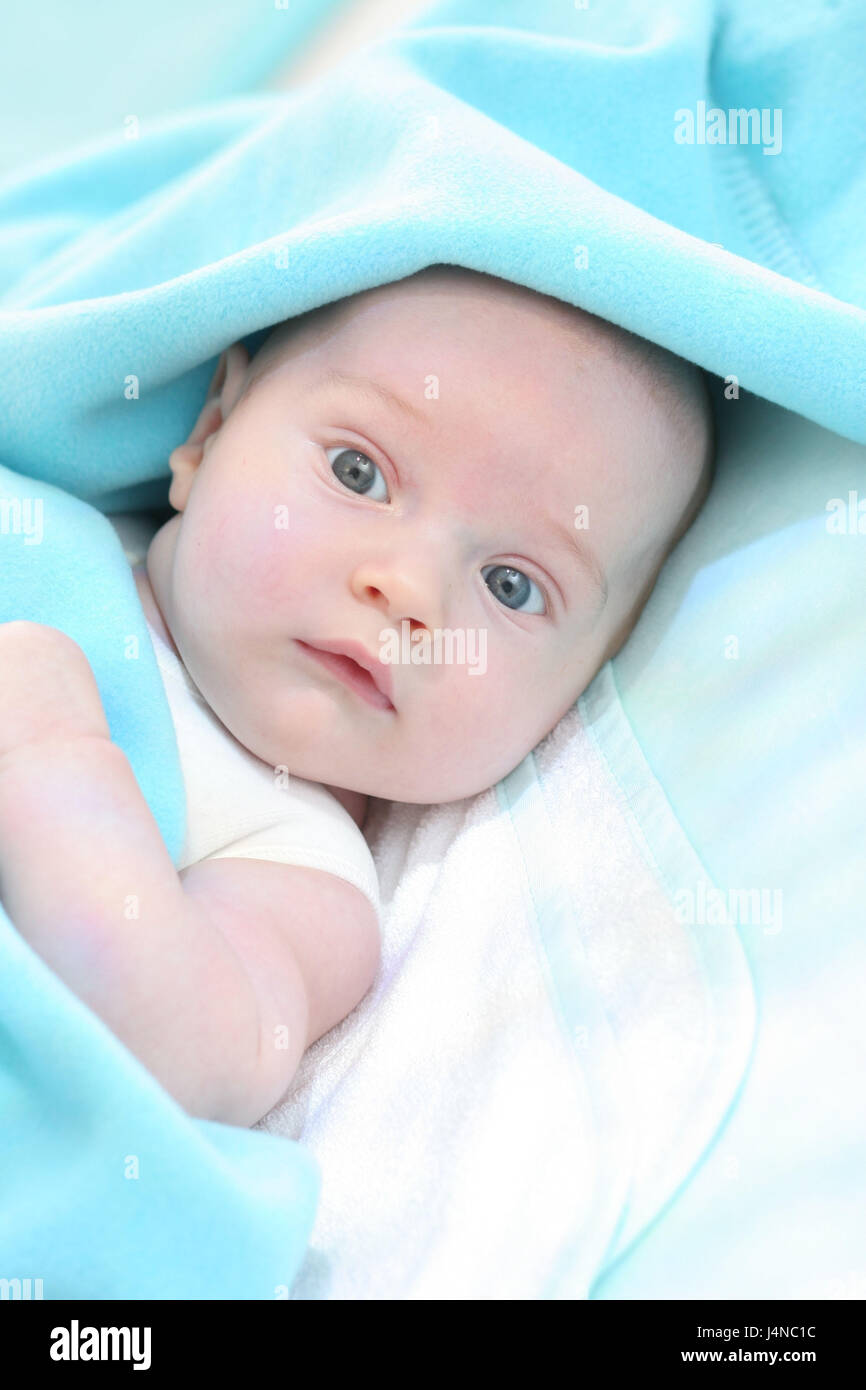 Baby, 4 months, covered, portrait Stock Photo - Alamy