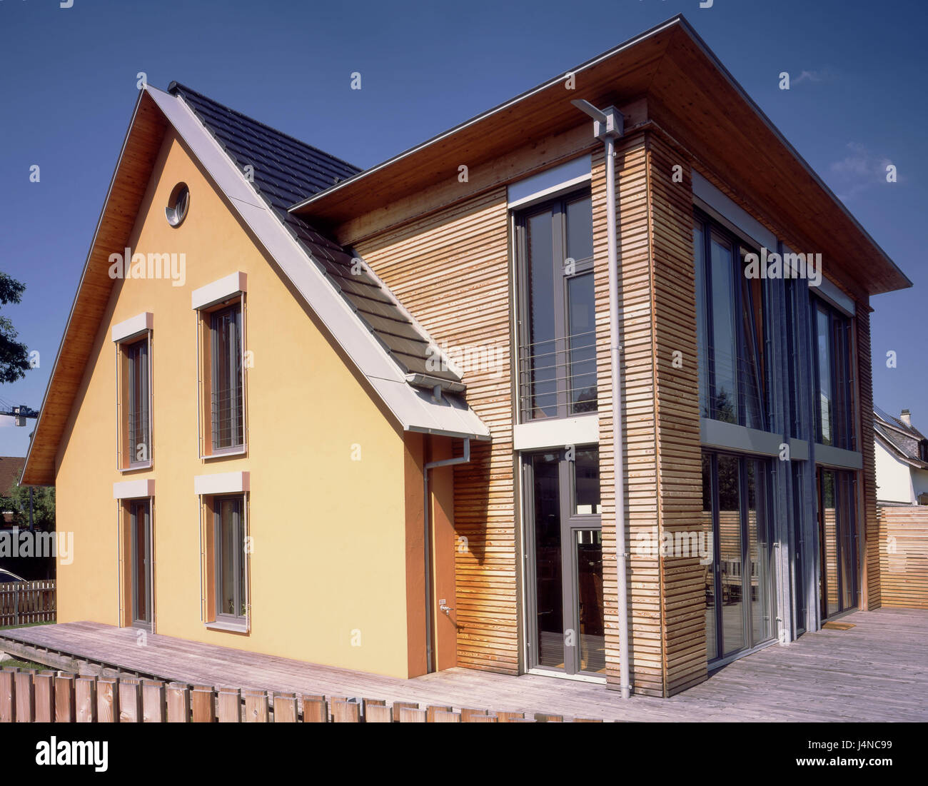 Single-family dwelling, annex, house, residential house, wooden facade ...