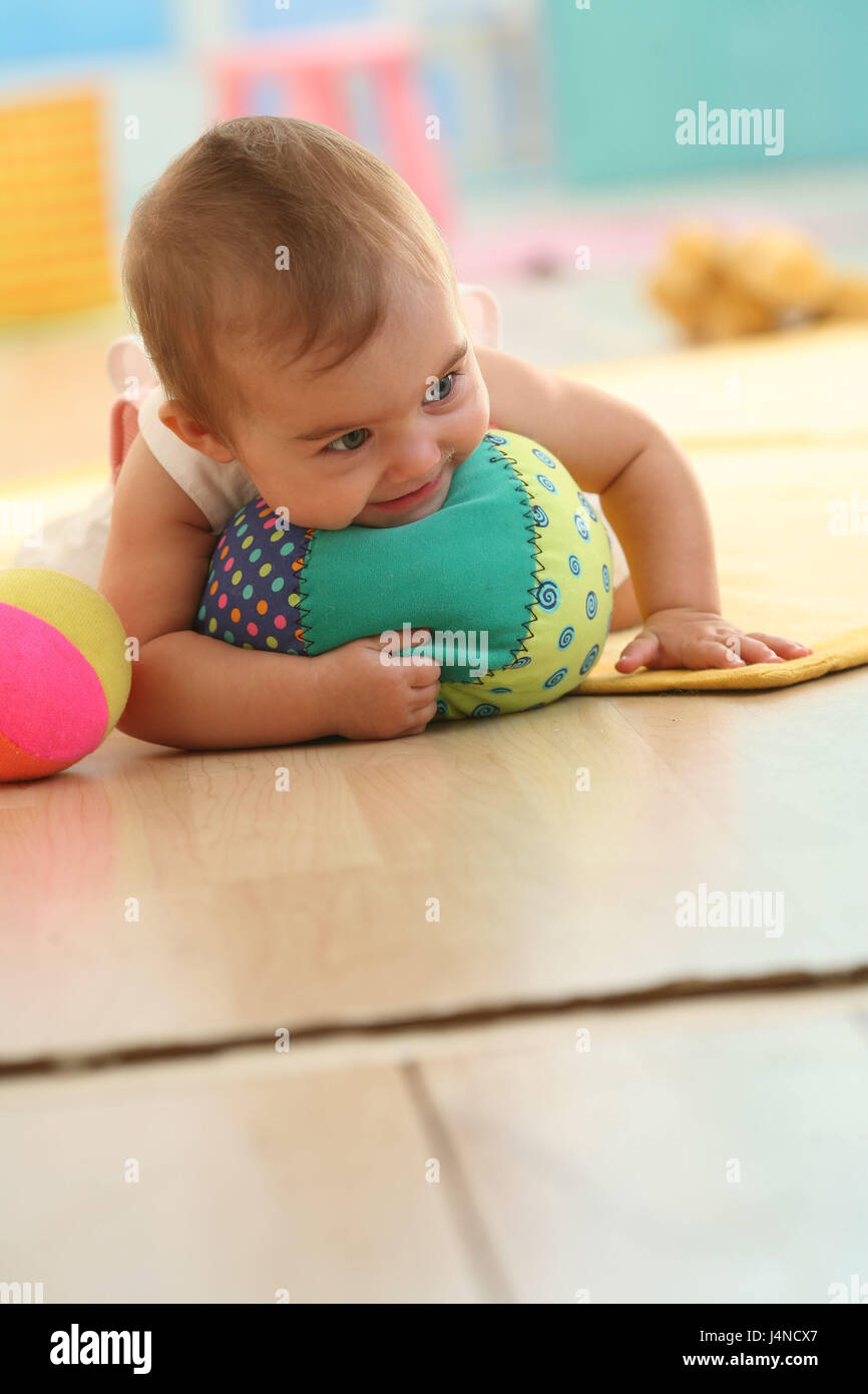 Baby, 8 months, smile, play substance ball, portrait Stock Photo - Alamy