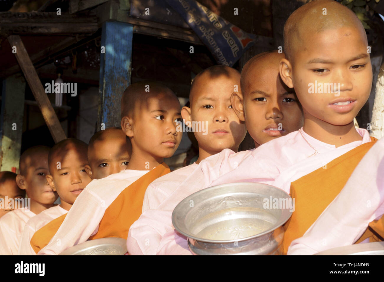 Monks, female, young, Buddhists, line-up, food output, Pyay, Myanmar ...