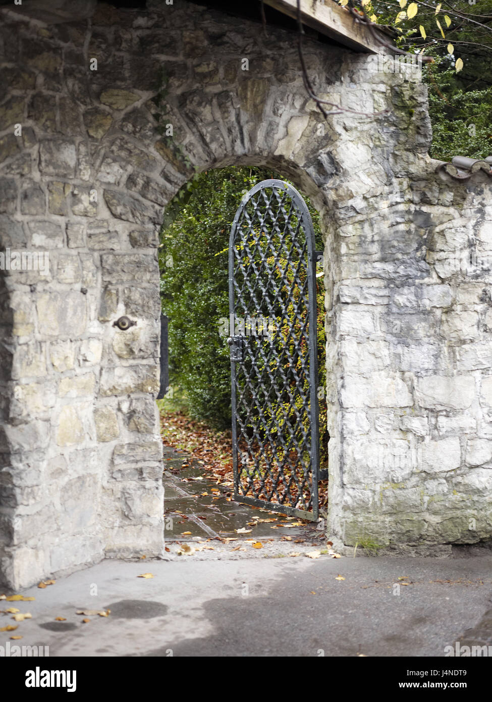 Stone defensive wall, iron goal Stock Photo - Alamy
