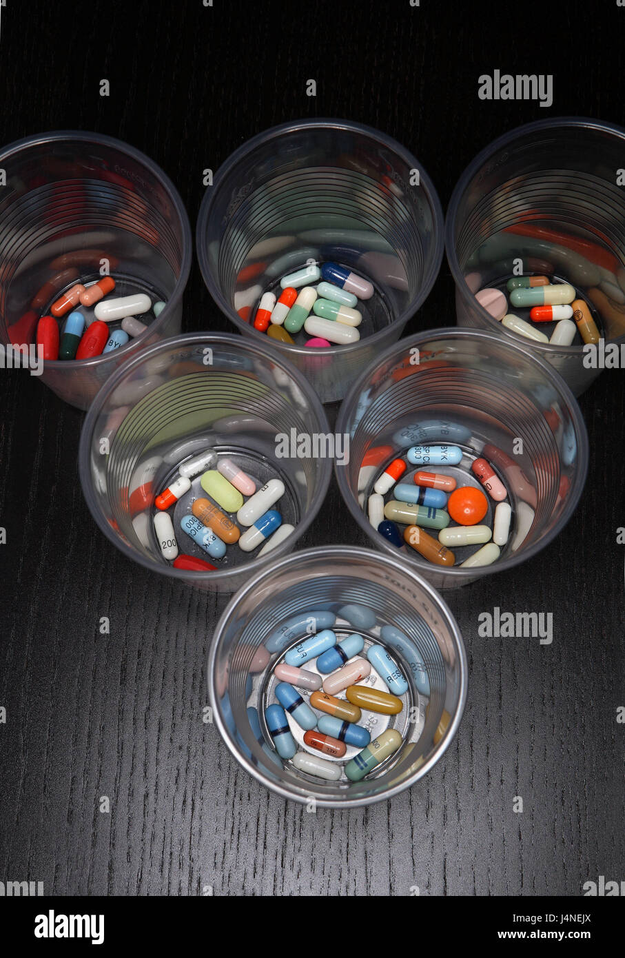 Plastic mugs, drug rations, day dose, table, vessels, mugs, six, drugs ...
