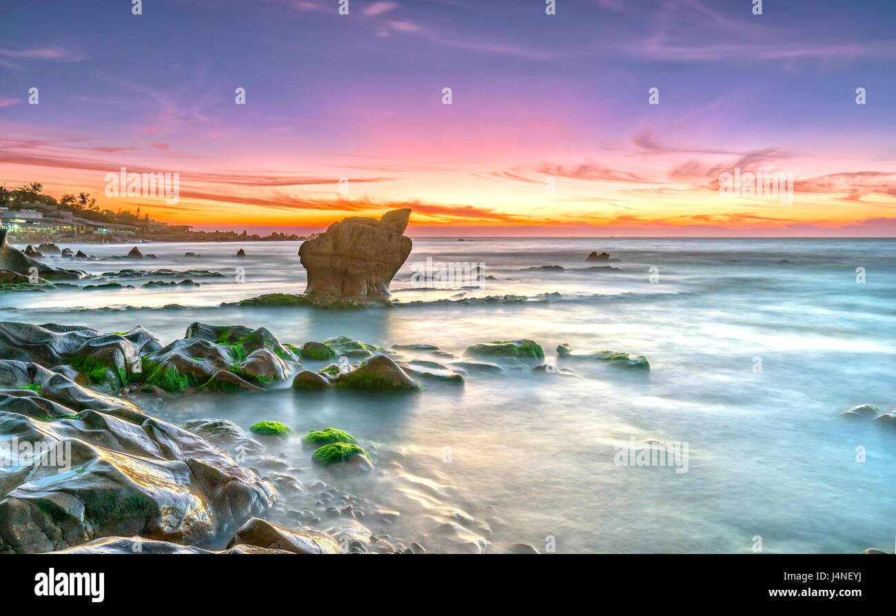 Dawn on ancient rocks moss covered with colorful sky welcome beautiful ...