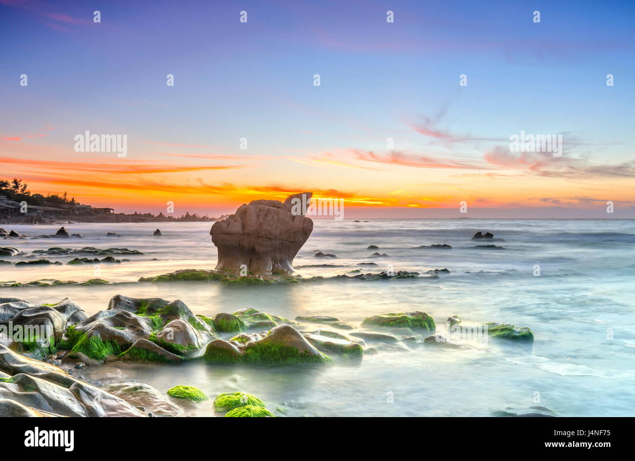 Dawn on ancient rocks moss covered with colorful sky welcome beautiful ...