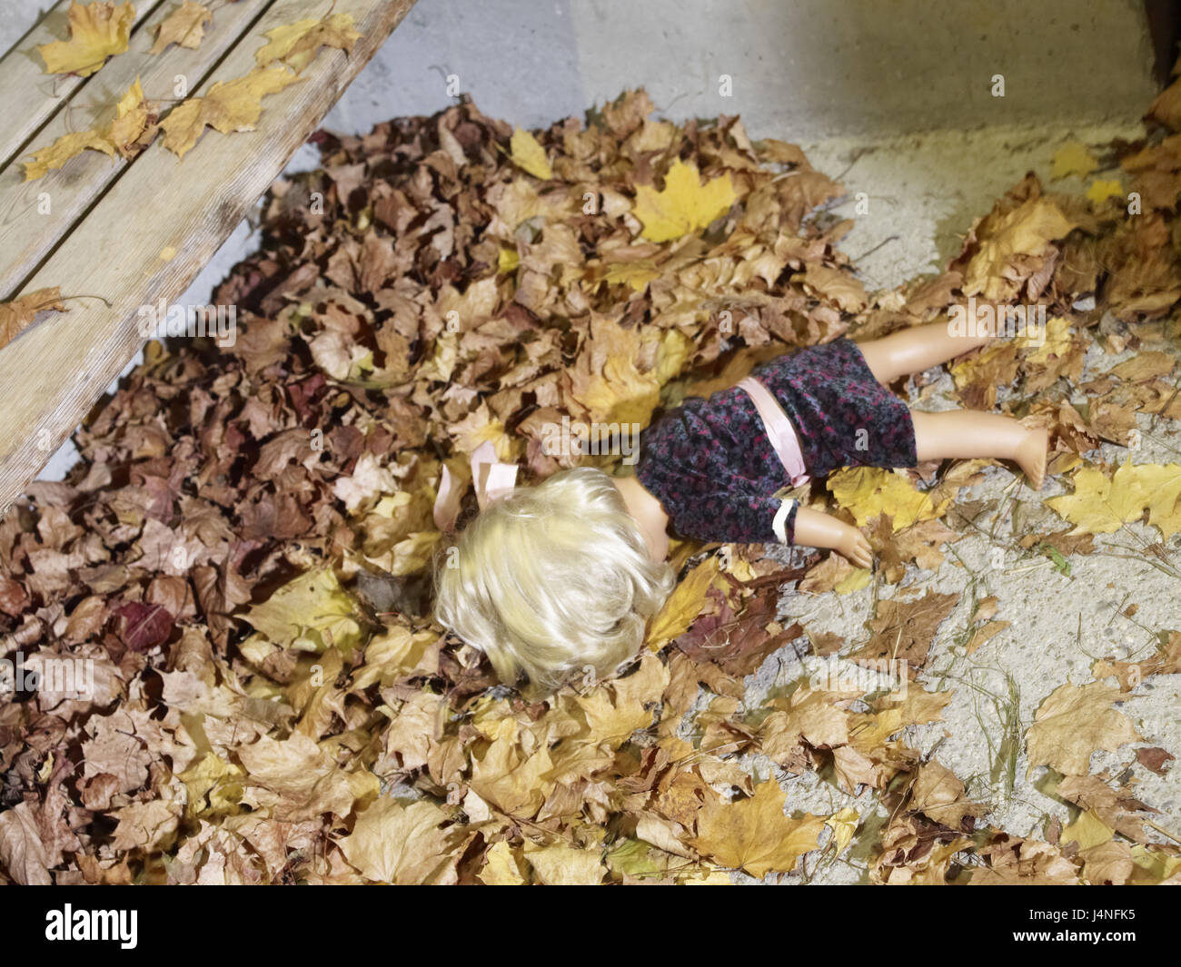 Doll, bus stop Stock Photo - Alamy