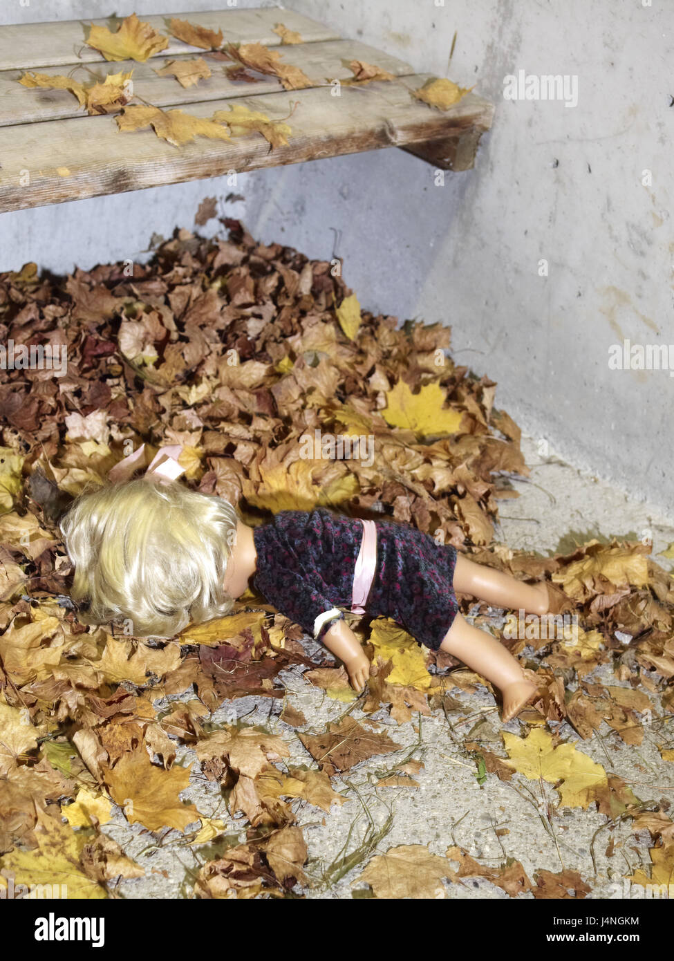 Doll, bus stop Stock Photo - Alamy