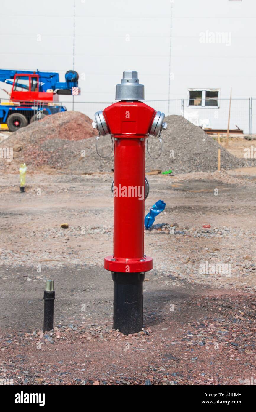 New fire hydrant on building site. Street construction. Fire safety ...