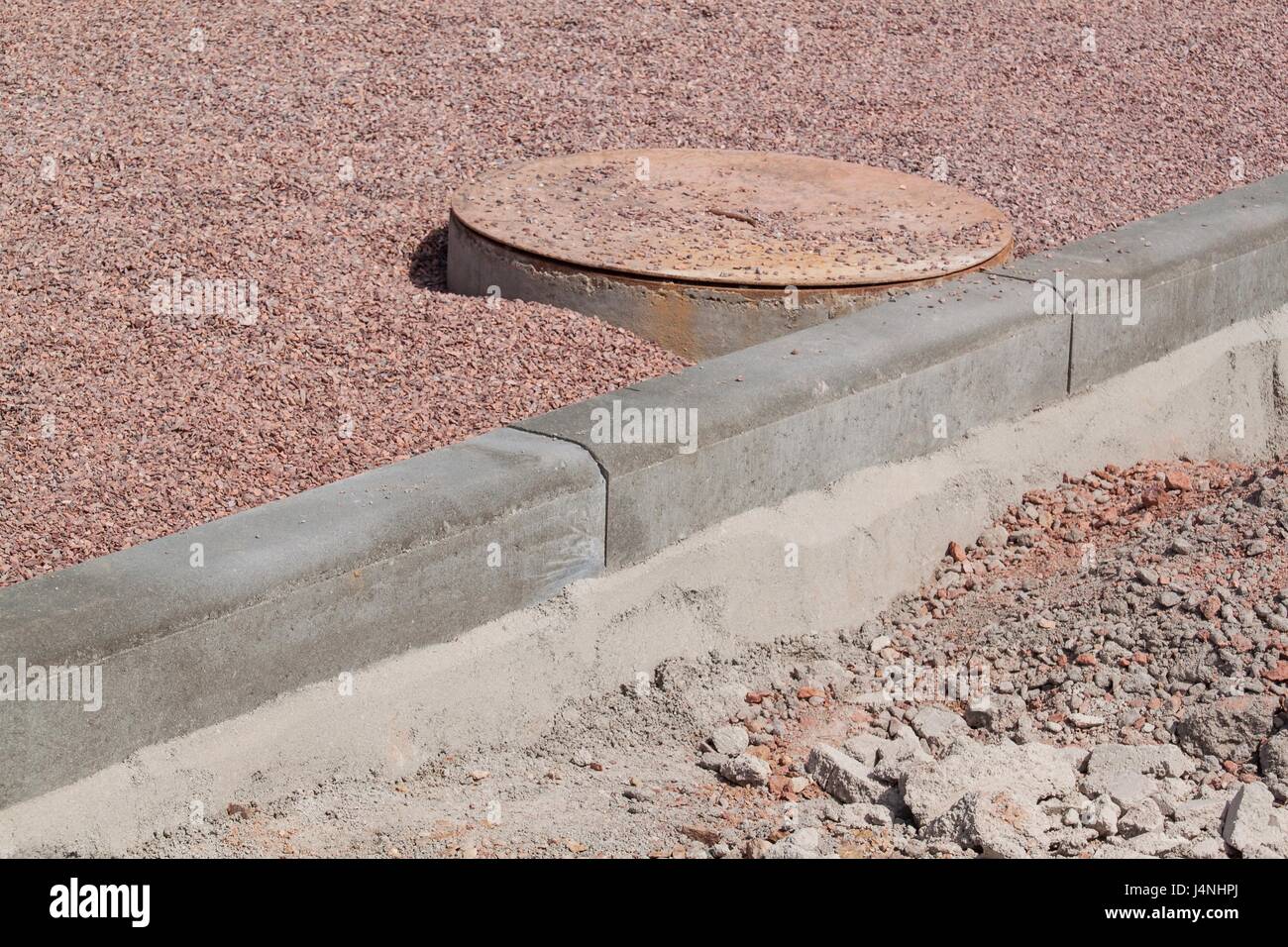 Concrete curb on new building site. Roadwork Stock Photo - Alamy