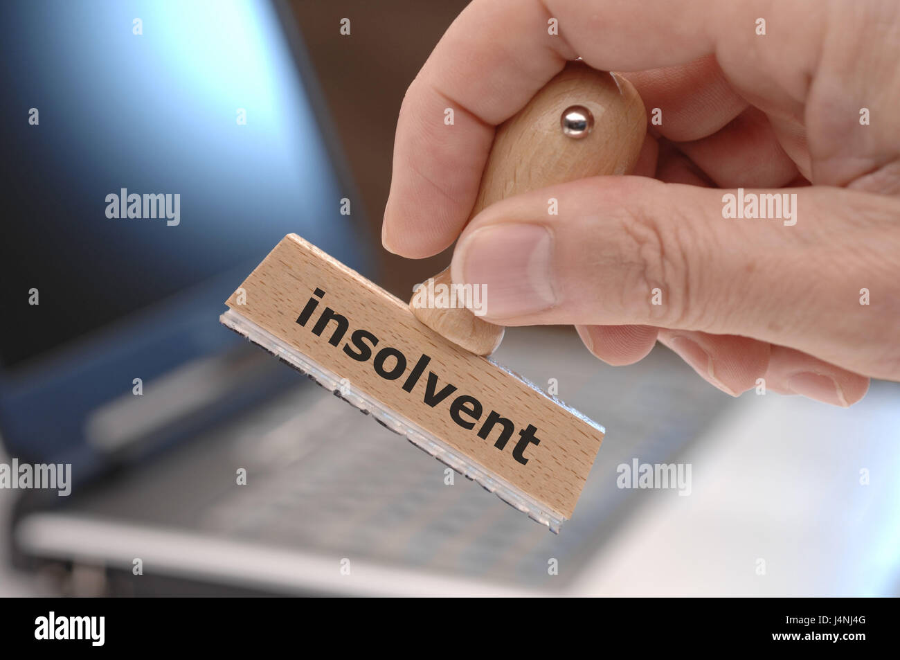 Hand, stamp, label, insolvent Stock Photo - Alamy
