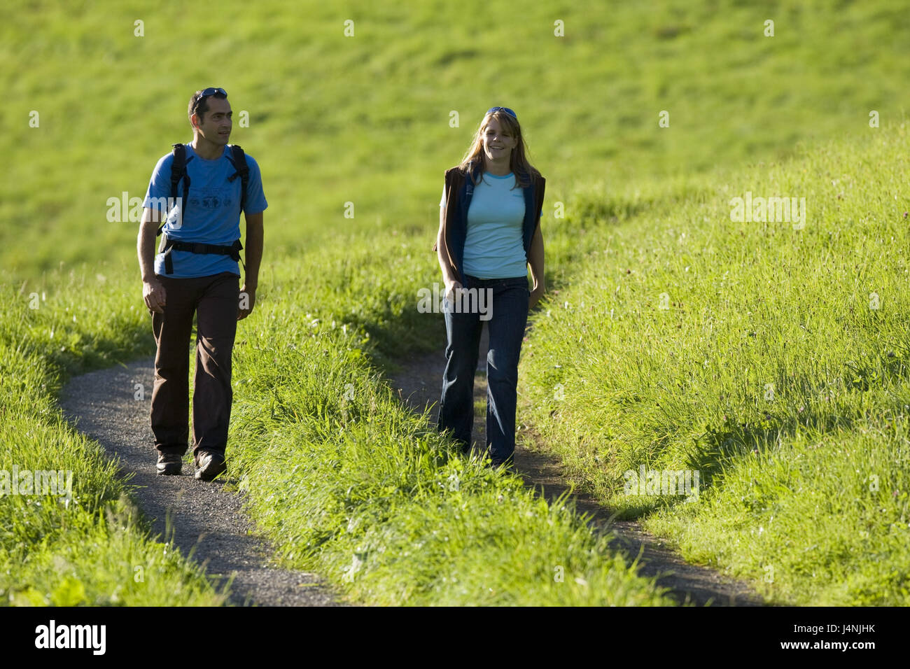Couple, walk, meadow, country lane, model released Stock Photo - Alamy
