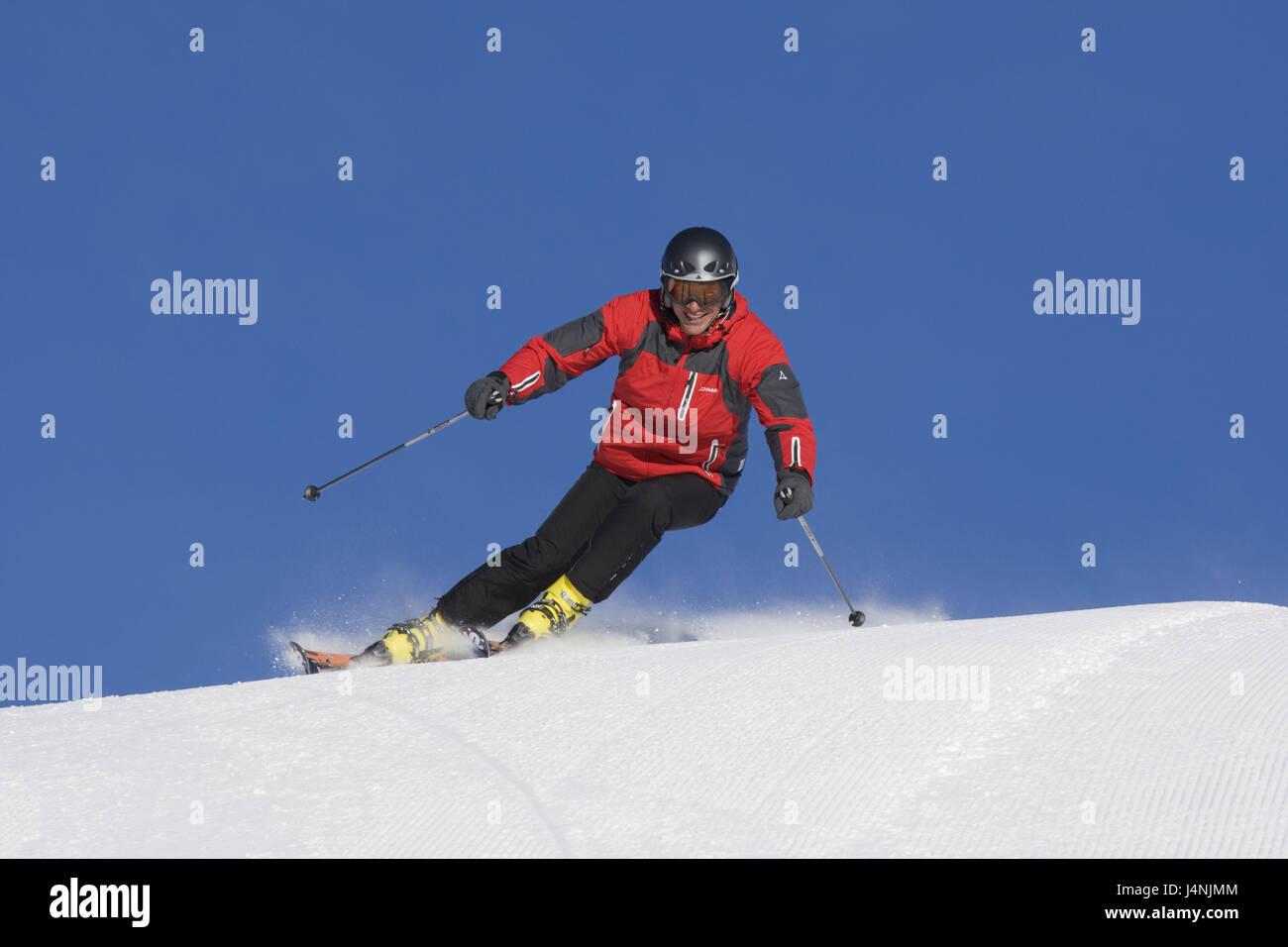 Ski runway, skier, model released Stock Photo - Alamy