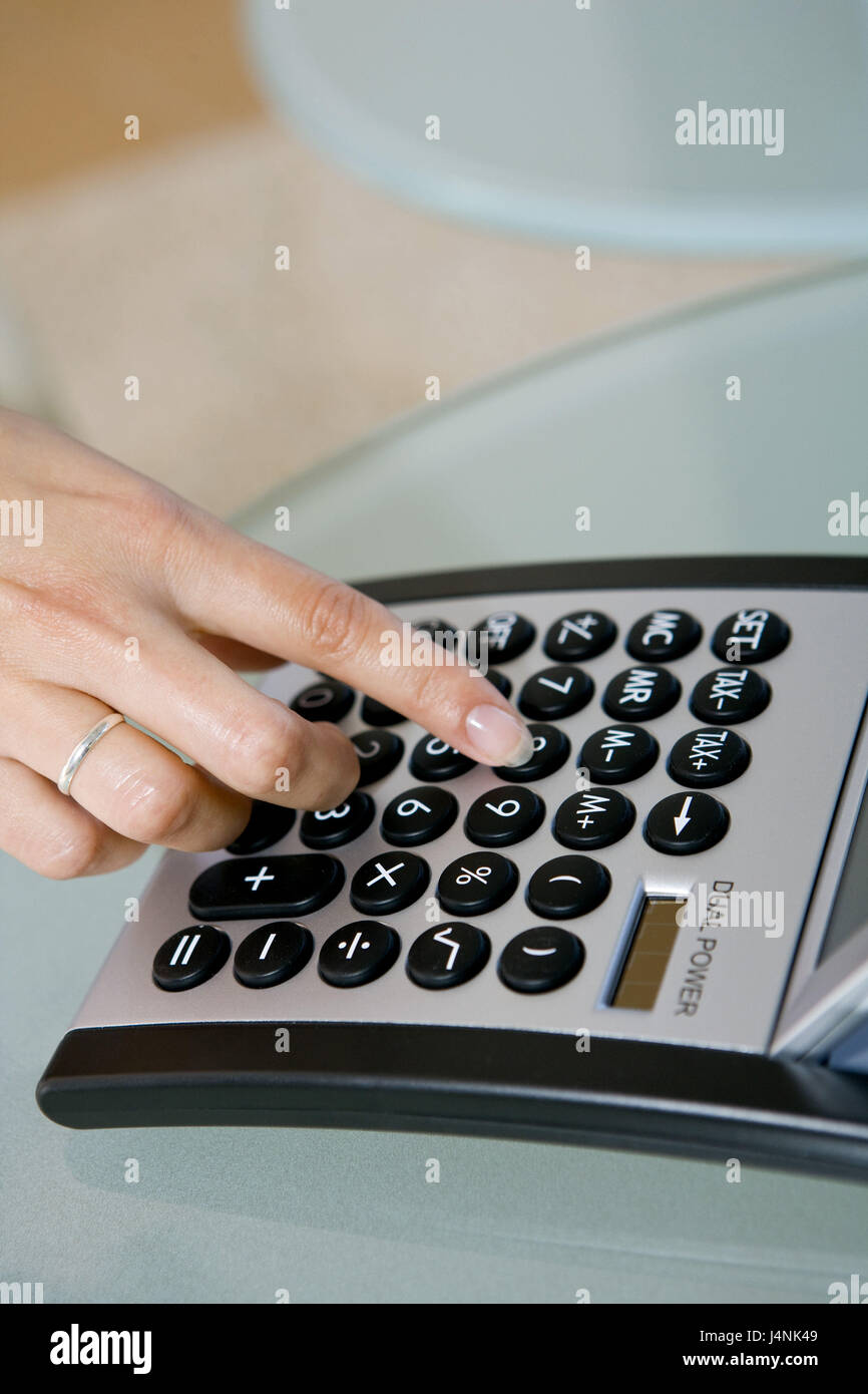 Women's hand, electronic calculator, serve Stock Photo - Alamy
