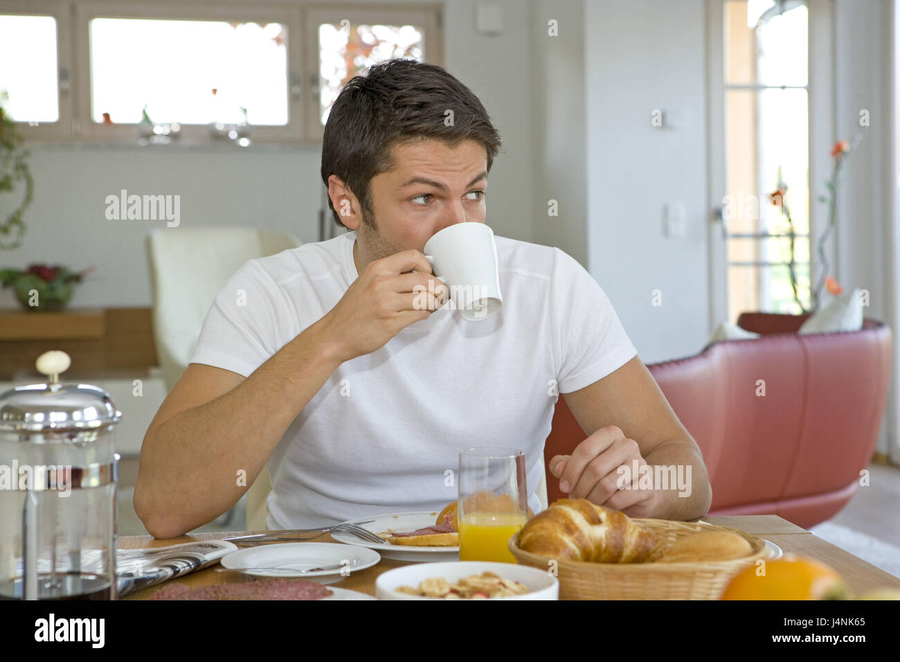 Man, young, breakfast, coffee, drink Stock Photo - Alamy