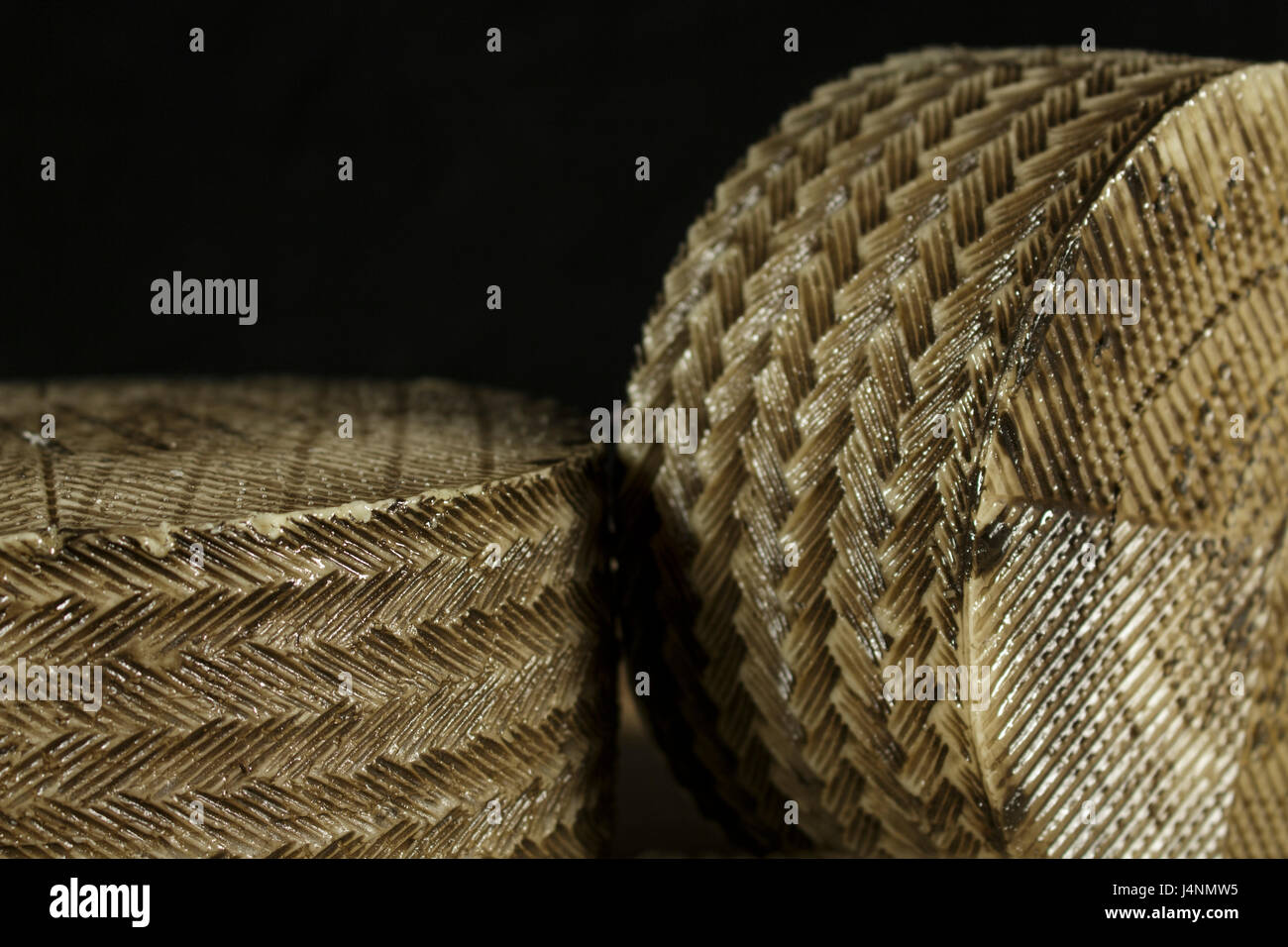 Detail of zigzag pattern in the rind of Manchego cheeses created by the ...