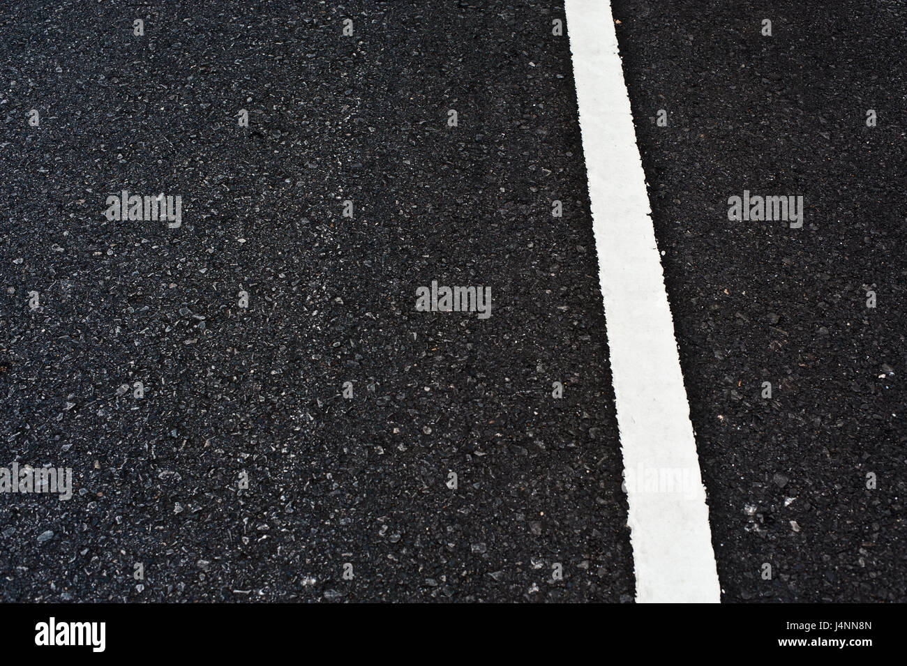 Close up asphalt surface of road divide white lines Stock Photo - Alamy