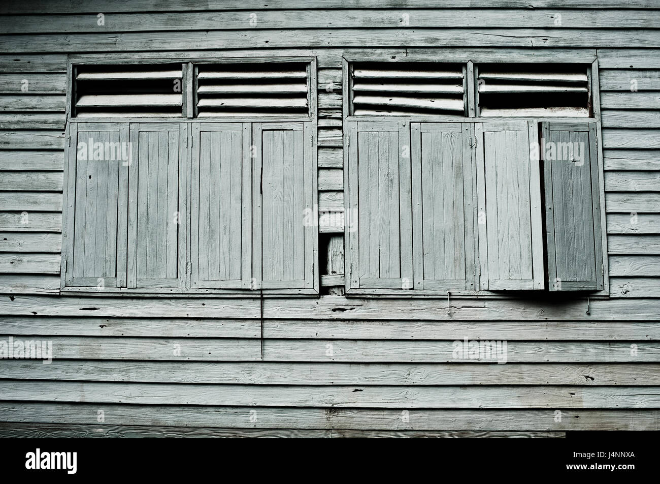 dark windows in old haunted house, abstract retro Stock Photo - Alamy