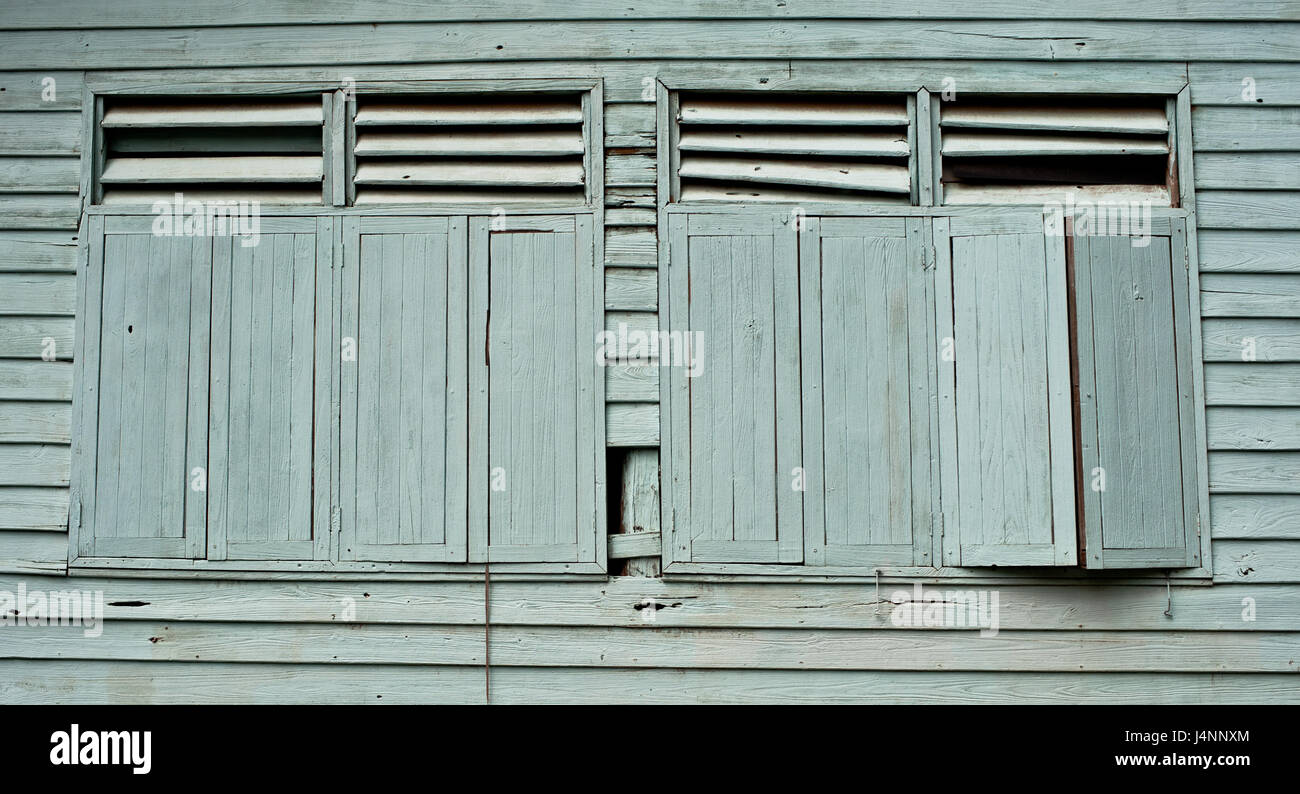dark windows in old haunted house, abstract retro Stock Photo - Alamy