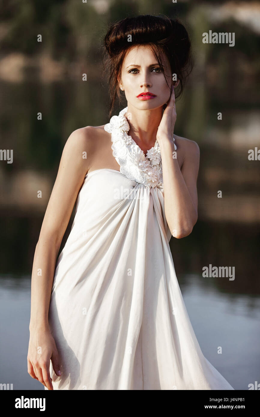 girl on a riverside in summer in beautiful nature Stock Photo - Alamy