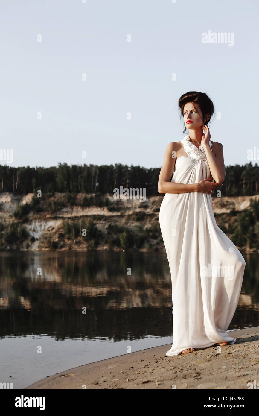 girl on a riverside in summer in beautiful nature Stock Photo - Alamy
