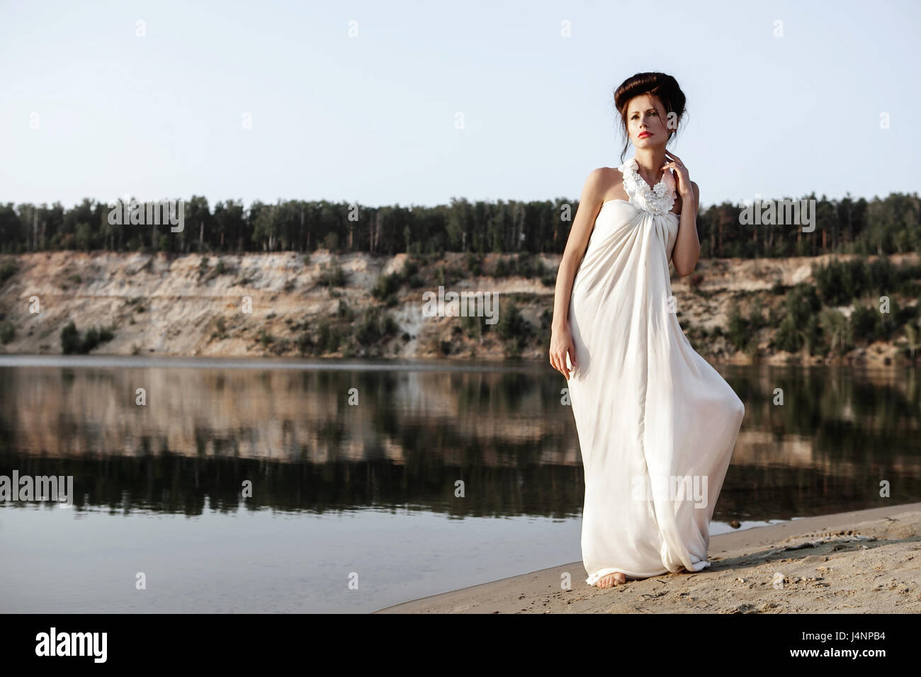girl on a riverside in summer in beautiful nature Stock Photo - Alamy