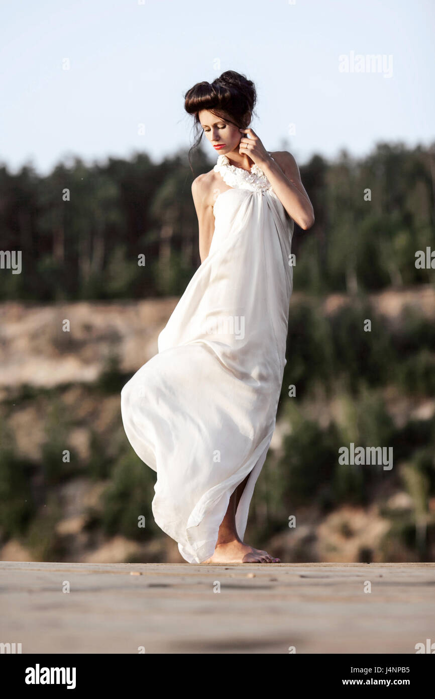 girl on a riverside in summer in beautiful nature Stock Photo - Alamy