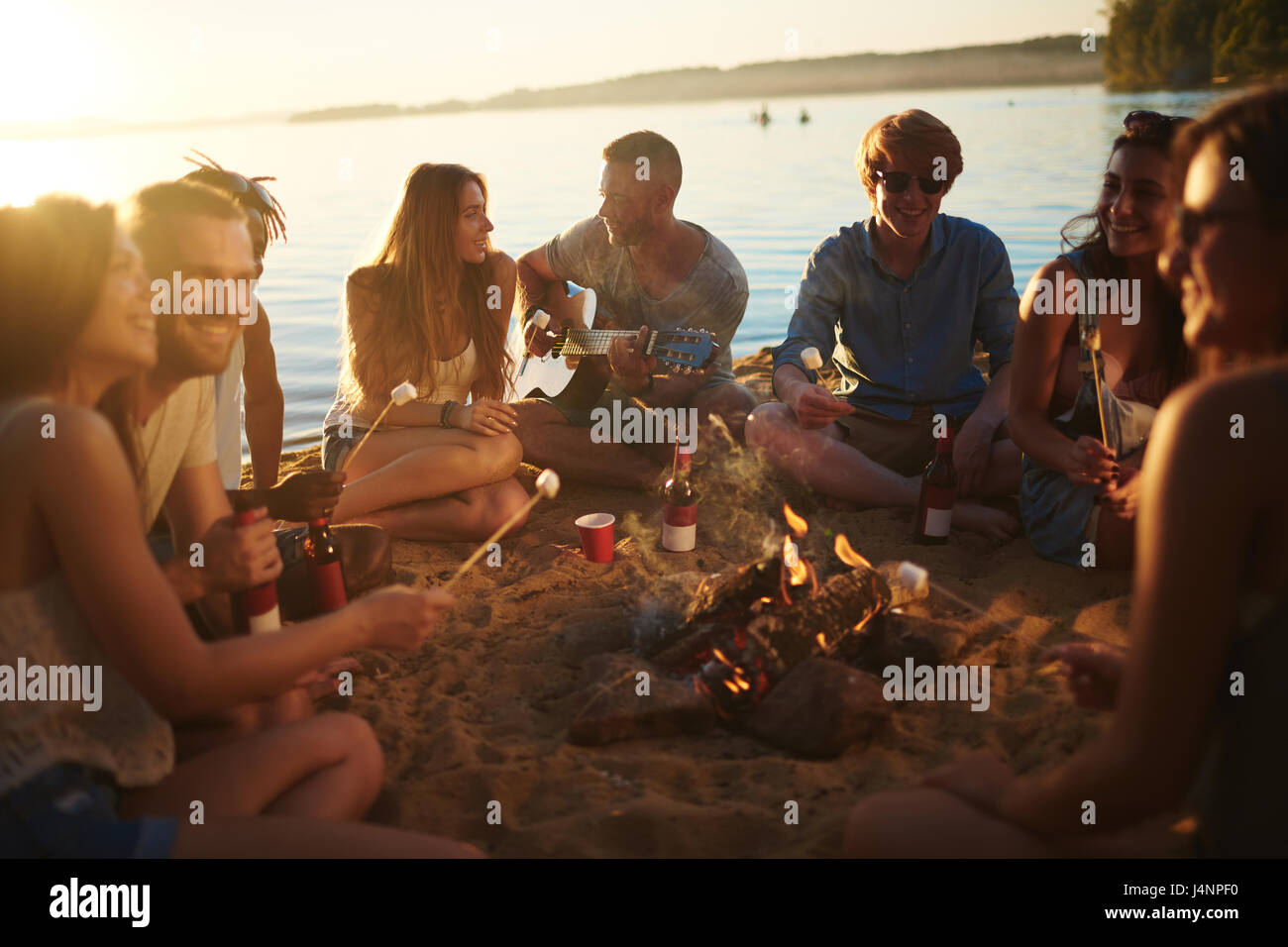 Gathering around the fire hi-res stock photography and images - Alamy