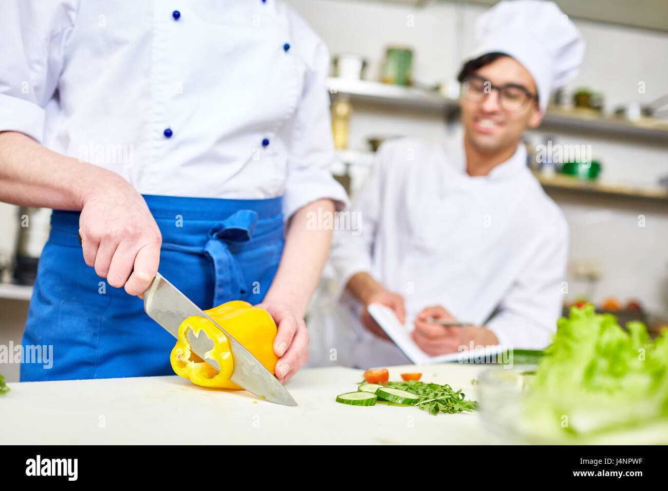 Trainee attending classes of cooking healthy food Stock Photo - Alamy