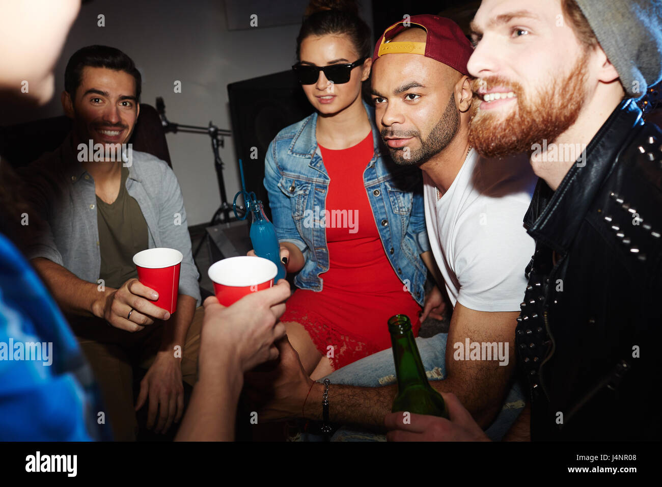 Multi ethnic friends enjoying nightlife hi-res stock photography and ...