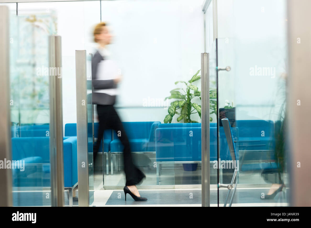 Blurred human figure in motion Stock Photo - Alamy